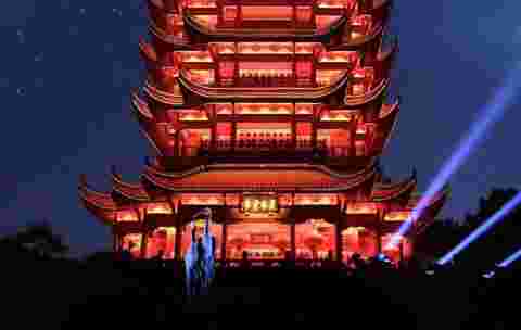Barco lighting up the Yellow Crane Tower in Wuhan for magic light show ...