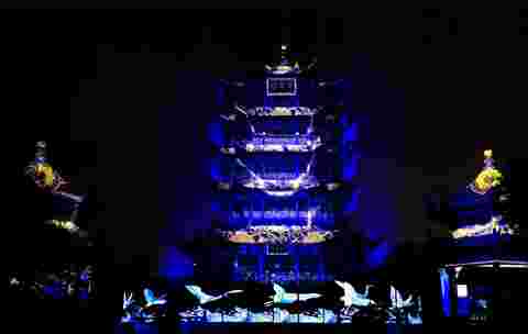 Barco lighting up the Yellow Crane Tower in Wuhan for magic light show ...
